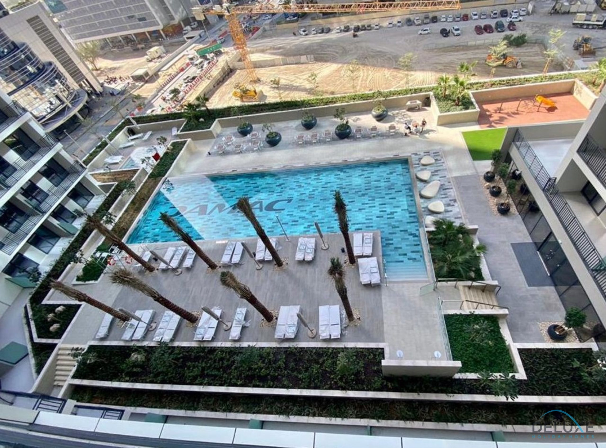 Scenic 1BR at DAMAC Zada Tower - Deluxe Holiday Homes™